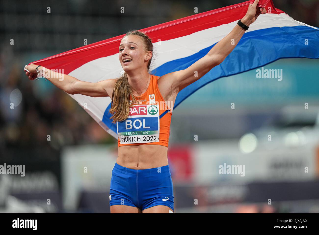 Femke Bol with her country's flag as the winner of the 400 meters ...