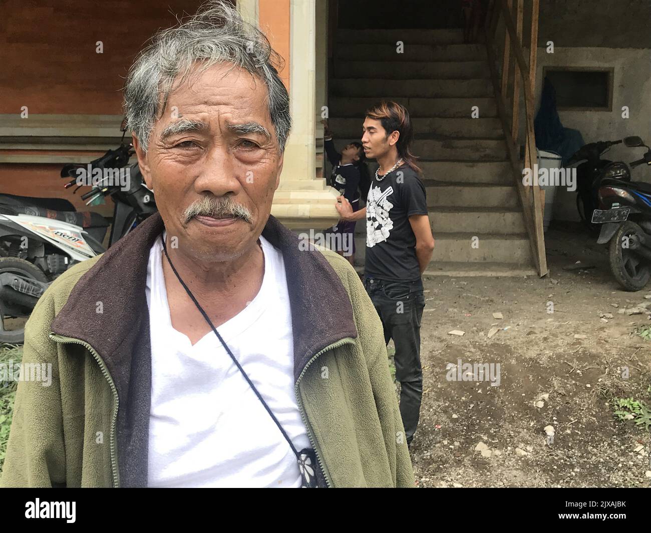 Refugee from the Mount Agung volcanic eruption Nengah Sedeng at Bangli ... Refugee from the Mount Agung volcanic eruption Nengah Sedeng at Bangli ...