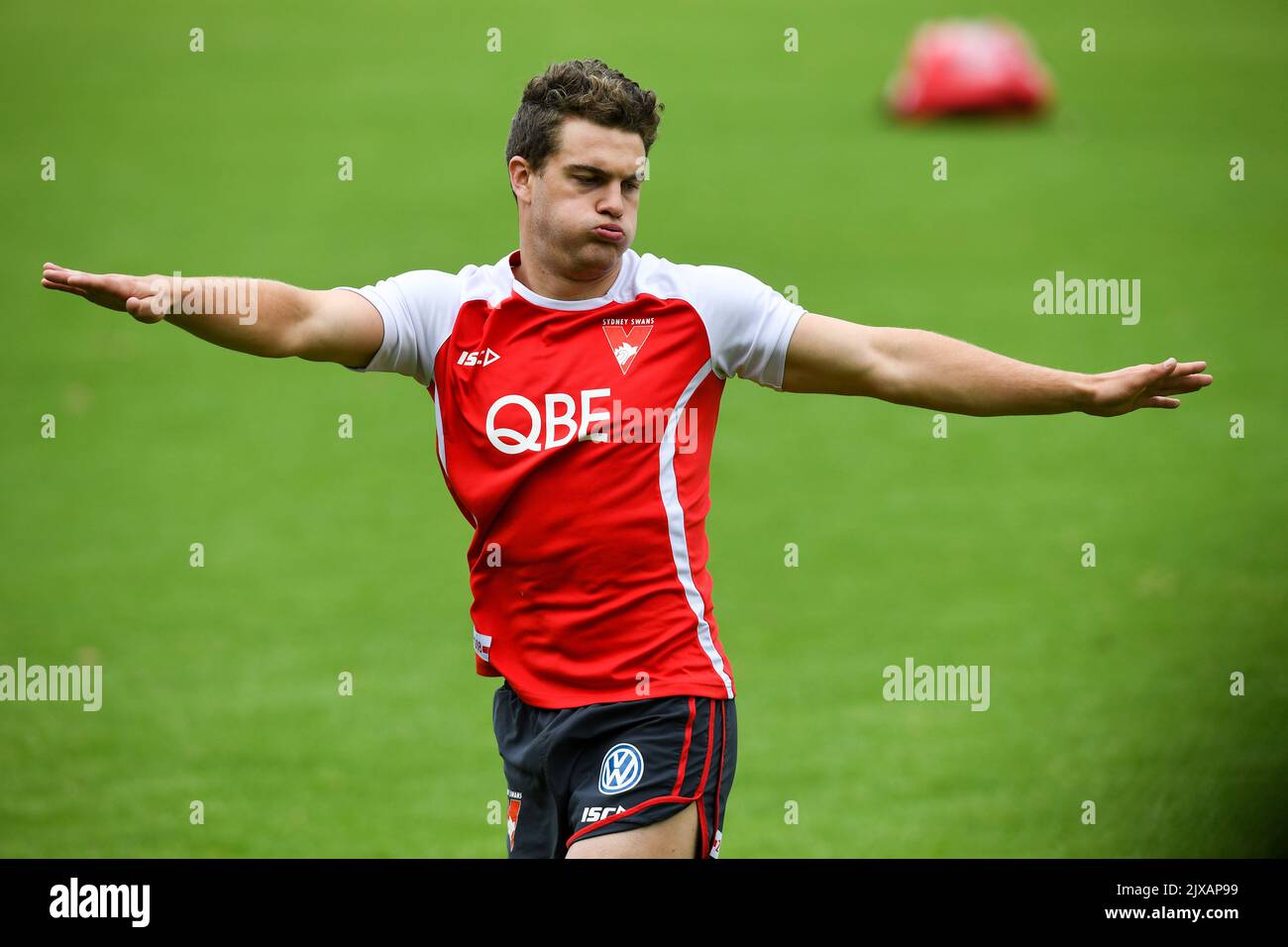 Sydney Swans AFL player Tom Papley stretching during the Sydney Swans ...