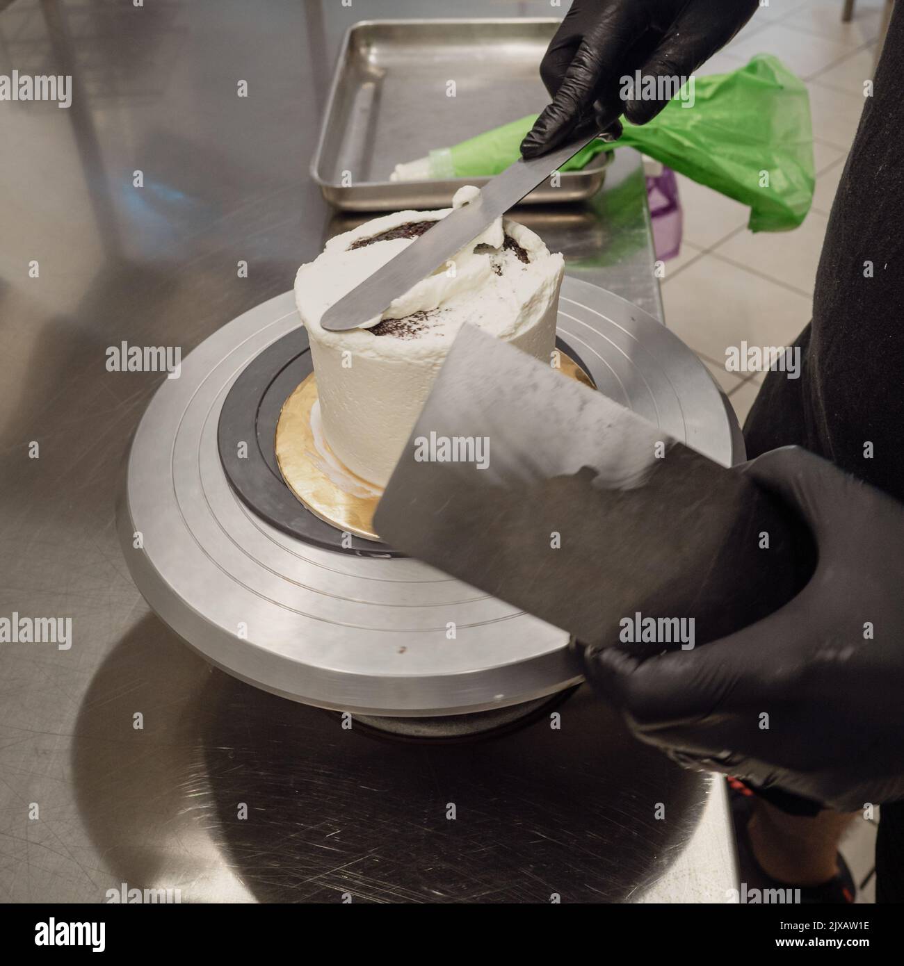 chef at work preparing a drip cake Stock Photo - Alamy