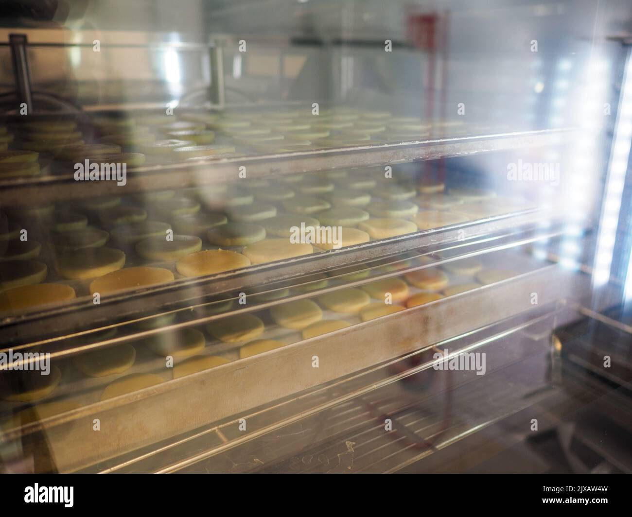 baker baking cooking in the kitchen of a lab Stock Photo - Alamy