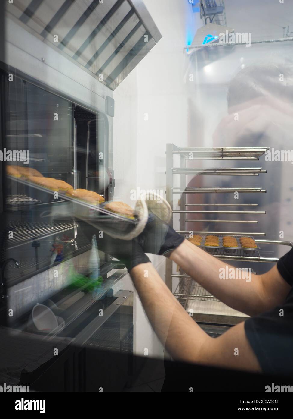 baker baking cooking in the kitchen of a lab Stock Photo - Alamy