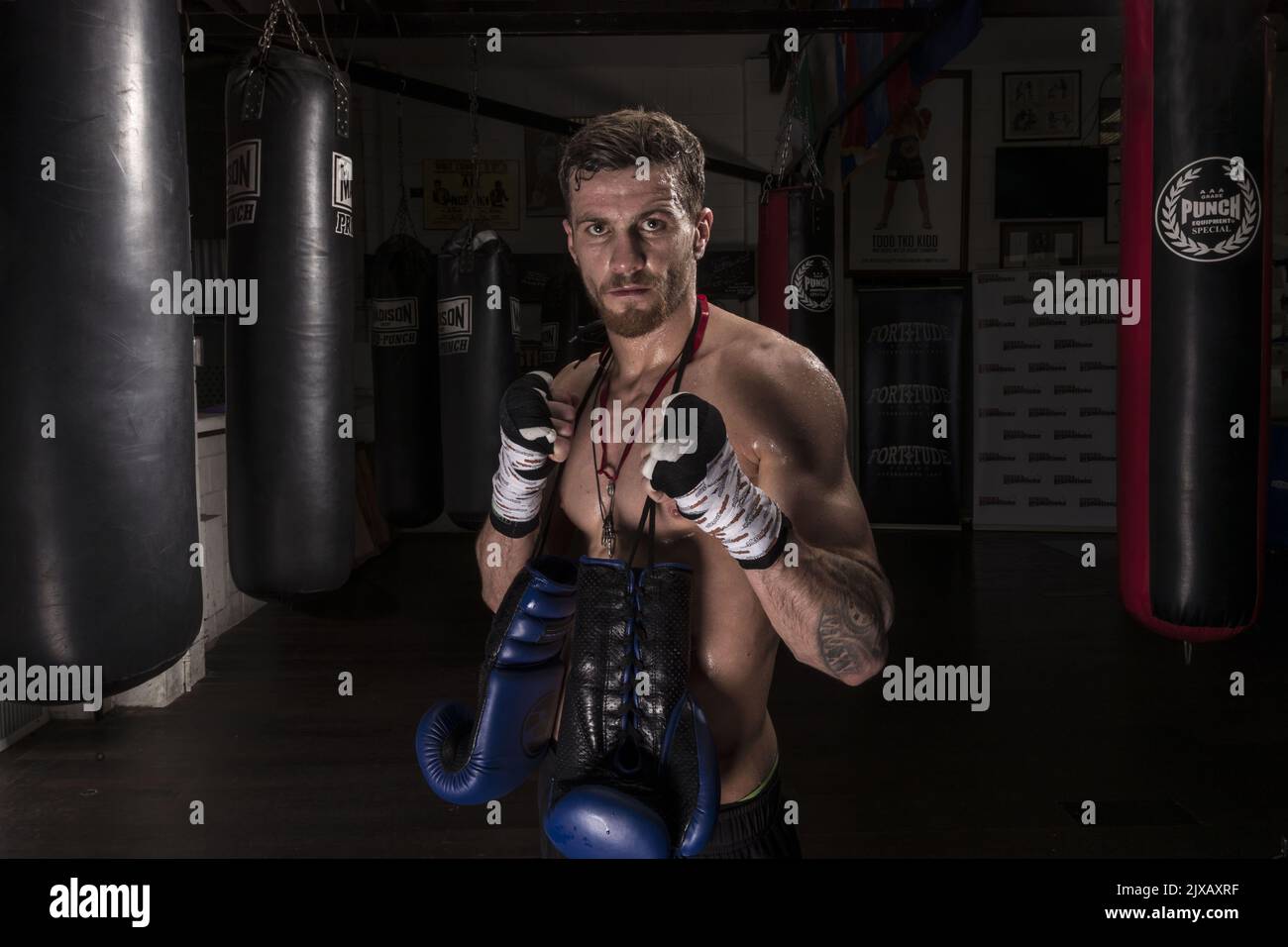 Boxer Gary Corcoran poses for a photograph during a training session at ...