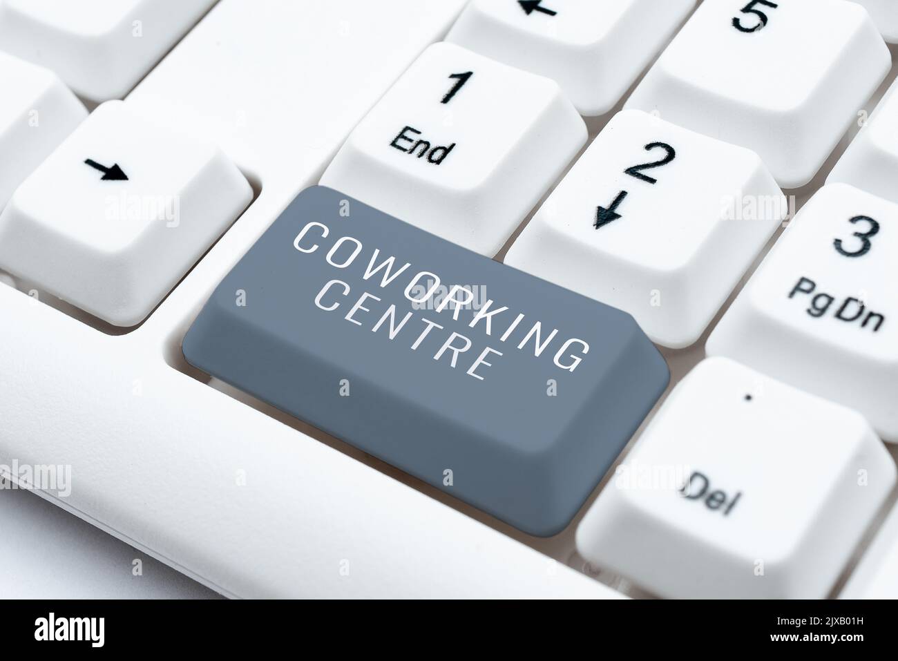 Hand writing sign Coworking Centreshared workplace often office and ...