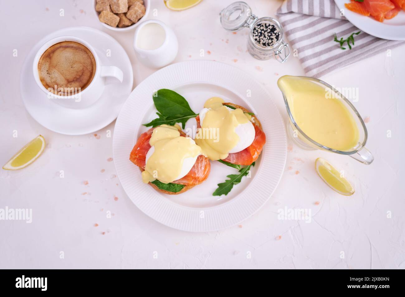 Eggs Benedict with Cream cheese and Smoked salmon on a plate Stock ...