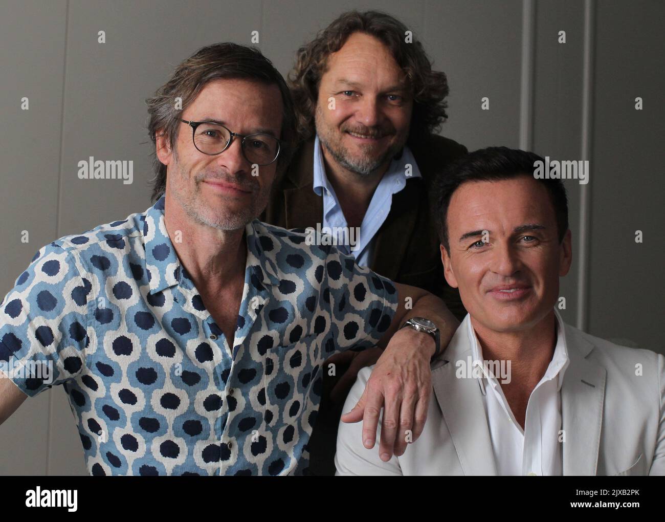 Actors Guy Pearce, Jeremy Sims and Julian McMahon pose for a photograph ...