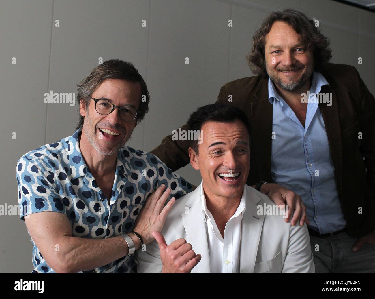 Actors Guy Pearce, Jeremy Sims and Julian McMahon pose for a photograph ...