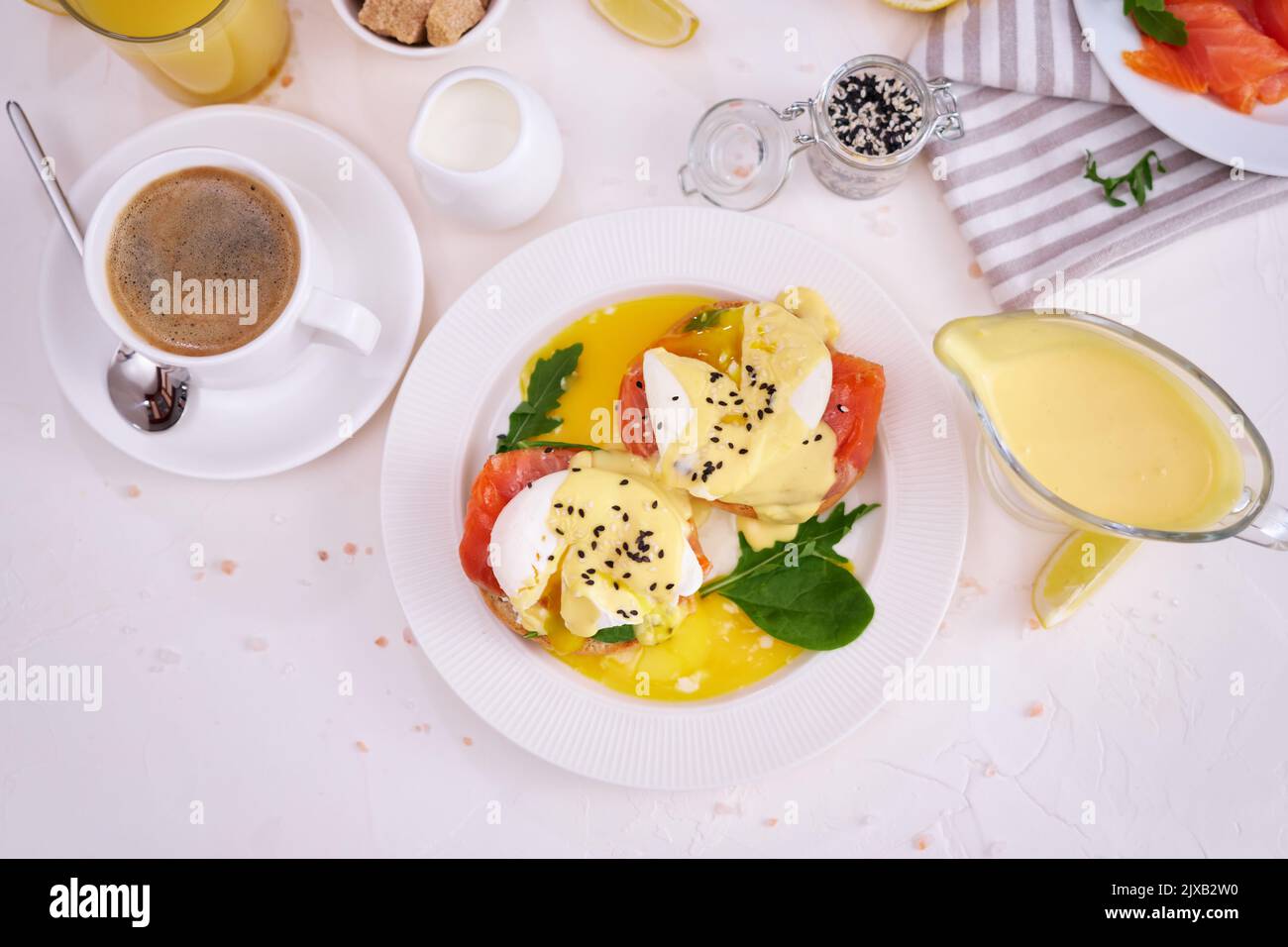 Eggs Benedict with Cream cheese and Smoked salmon on a plate Stock ...