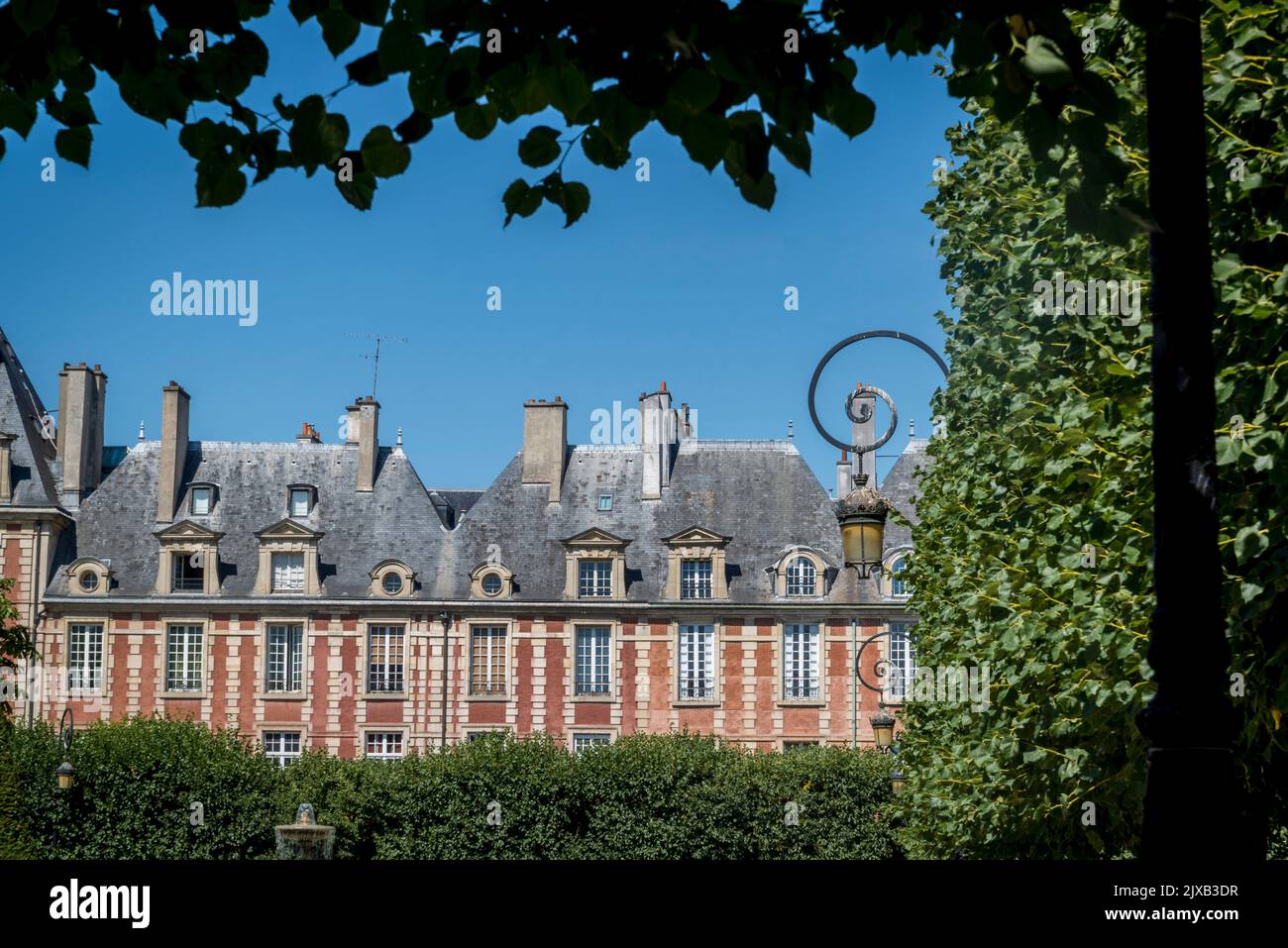 Place des Vosges, the oldest planned square in Paris, built in the 17th ...