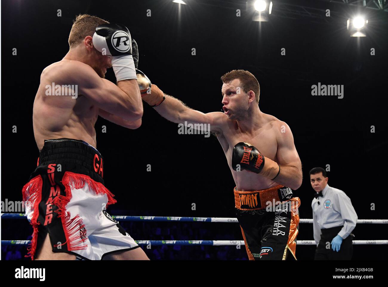 WBO World Welterweight Champion Jeff Horn of Australia (right) fights UK boxer Gary Corcoran ...