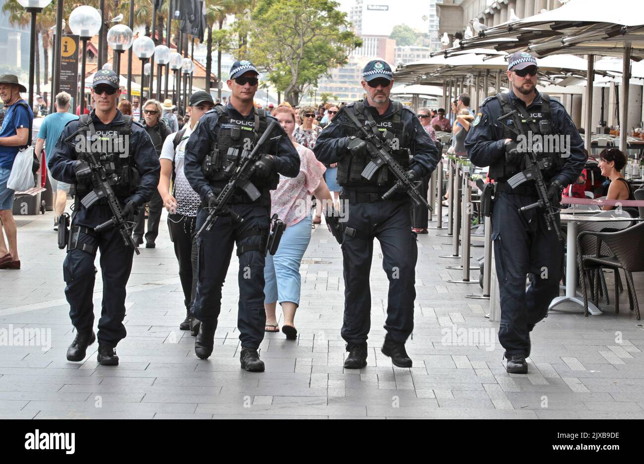 NSW riot squad police officers are seen at Circular Quay in Sydney ...