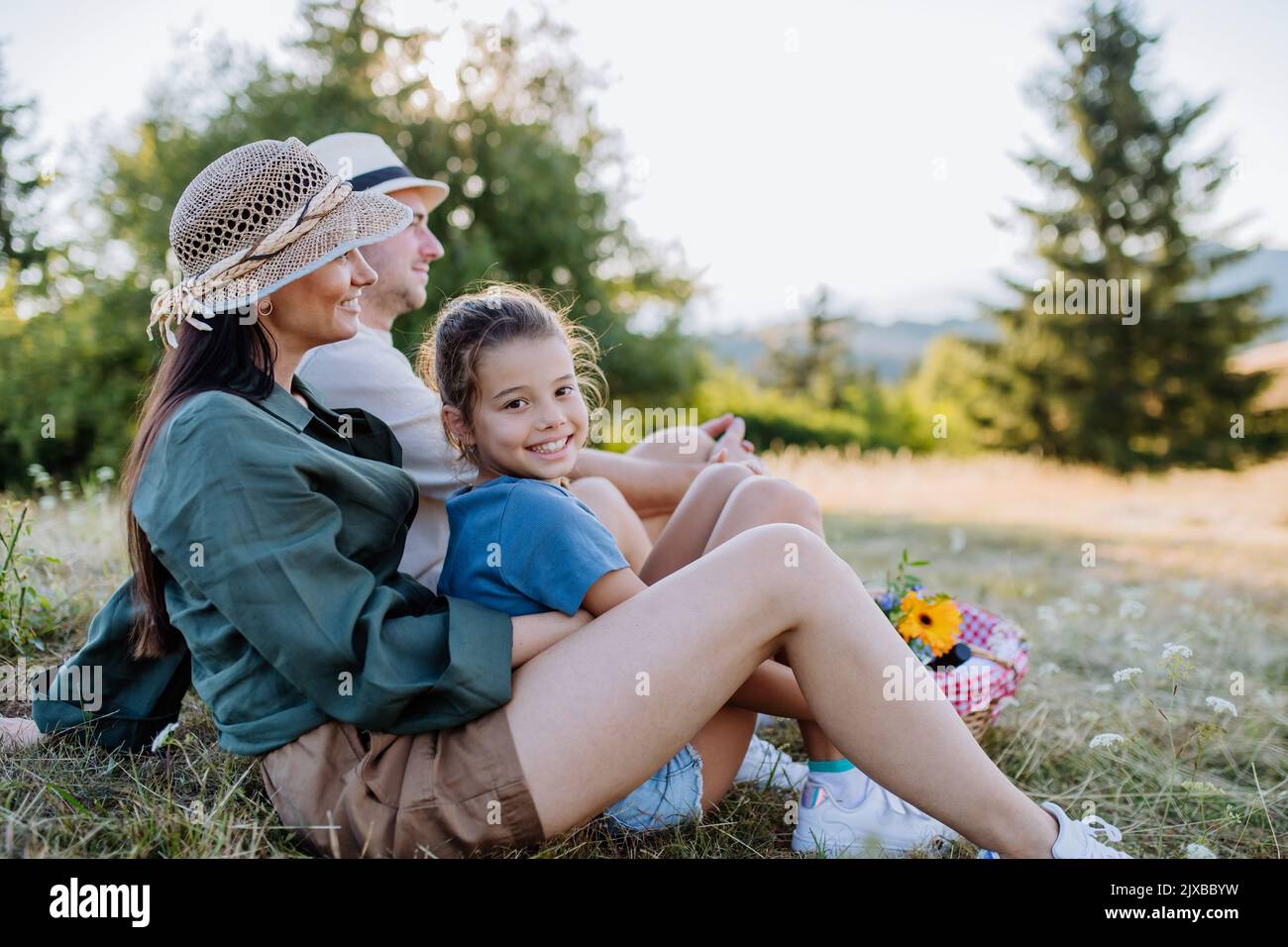 Happy mother and her daughter hugging together during family picnic in nature Stock Photo - Alamy