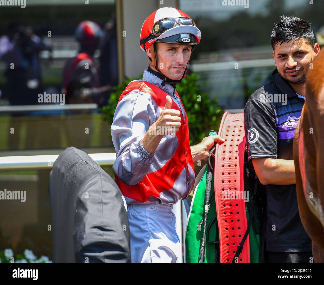 Jockey Tye England returns to scale after riding Scream Park to win ...