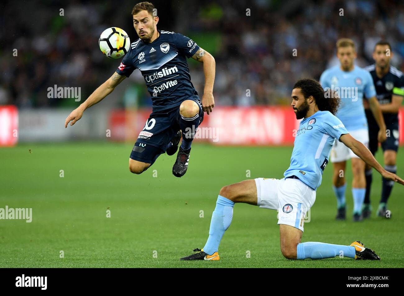 James Troisi of Victory and Osama Malik of City contest for the ball ...