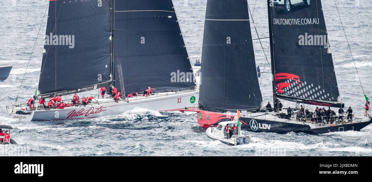 LDV Comanche (right) and Wild Oats XI narrowly miss each other as they ...