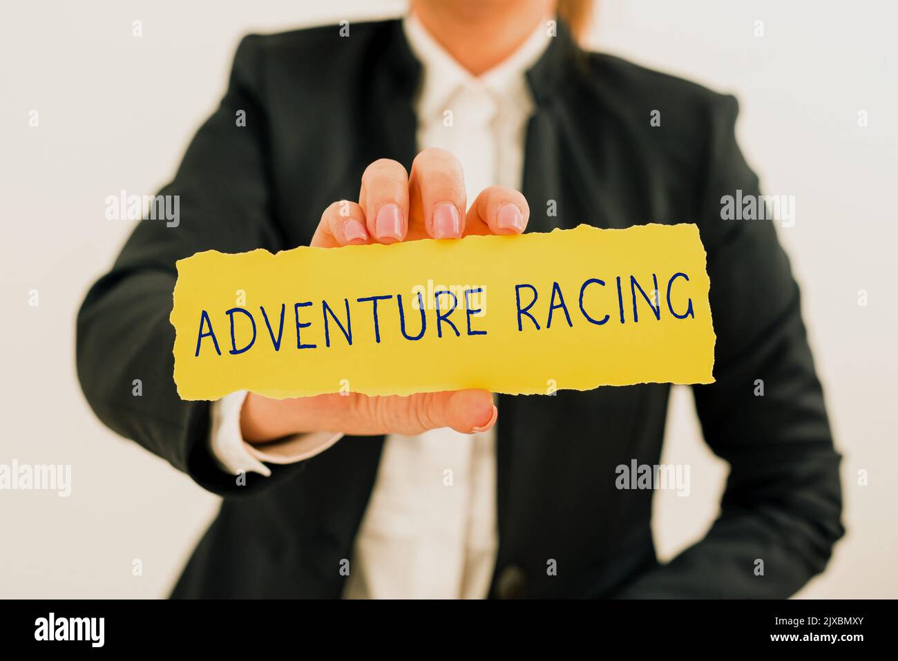 Sign displaying Adventure Racingdisciplinary sport involving navigation ...