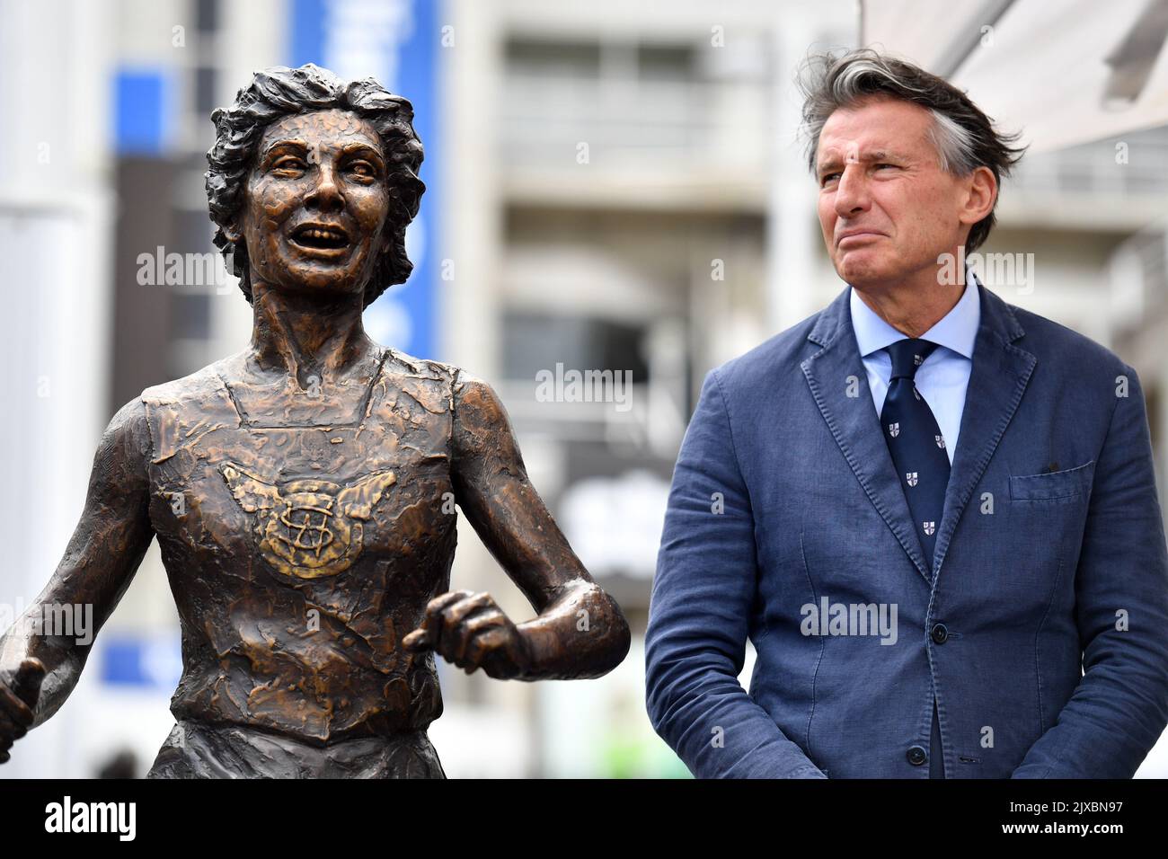 IAAF President, Lord Sebastian Coe with a bronze sculptures of ...