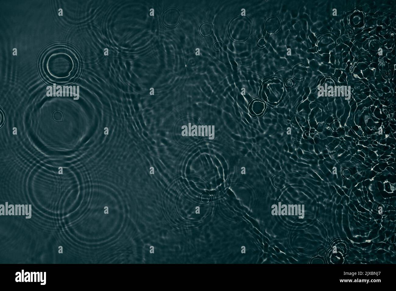 black transparent clear calm water surface texture Stock Photo - Alamy