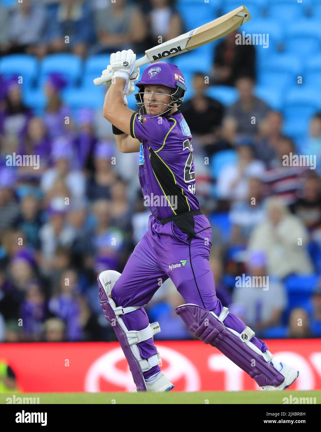 D'Arcy Short of the Hurricanes hits a boundary during the Big Bash ...