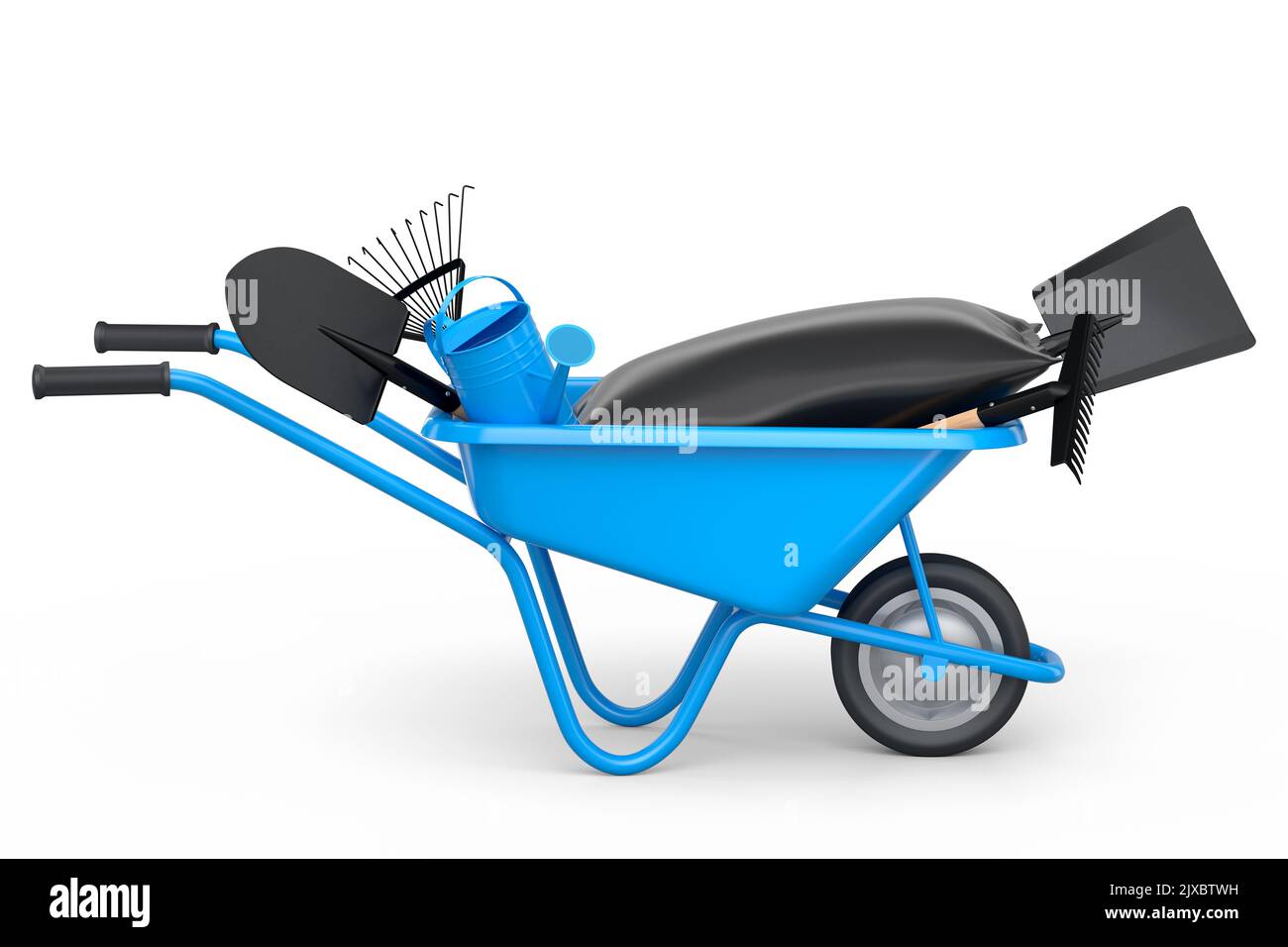 Garden wheelbarrow with garden tools like shovel, watering can and fork ...