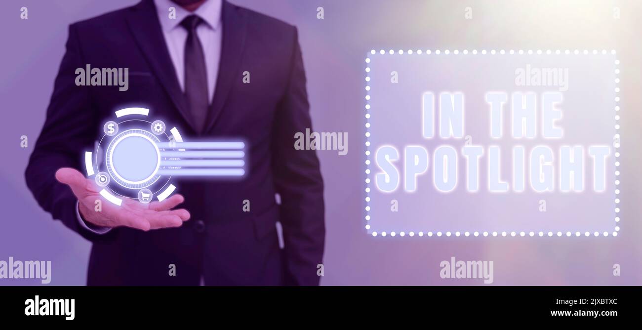 Text caption presenting In The Spotlightwhen crowd concentrating with ...