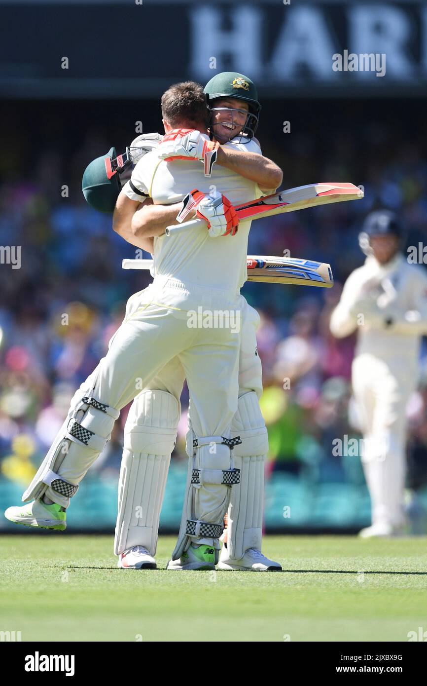 Australia's Mitchell Marsh hugs his brother Shaun Marsh as they ...