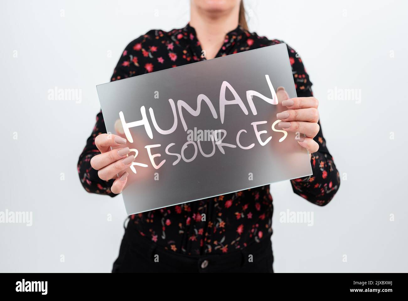 Sign displaying Human ResourcesThe people who make up the workforce of ...