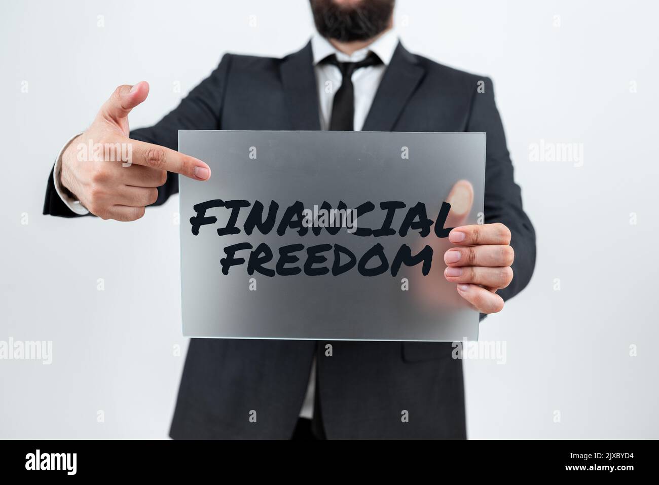 Hand writing sign Financial FreedomHaving money Free from worry when it ...