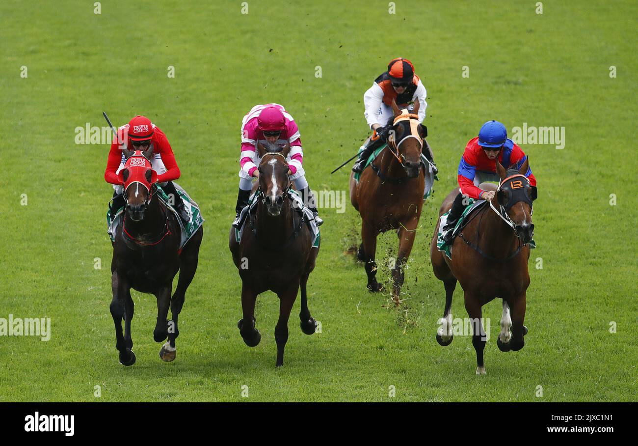 Jockey Jason Collett (right) rides Kool Vinnie to win race 3, the Tab ...