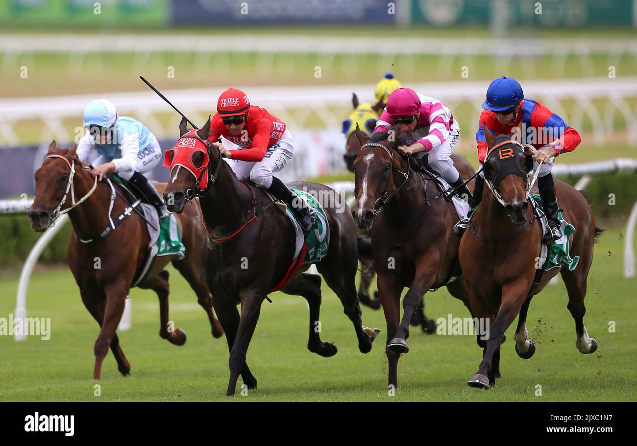 Jockey Jason Collett (right) rides Kool Vinnie to win race 3, the Tab ...