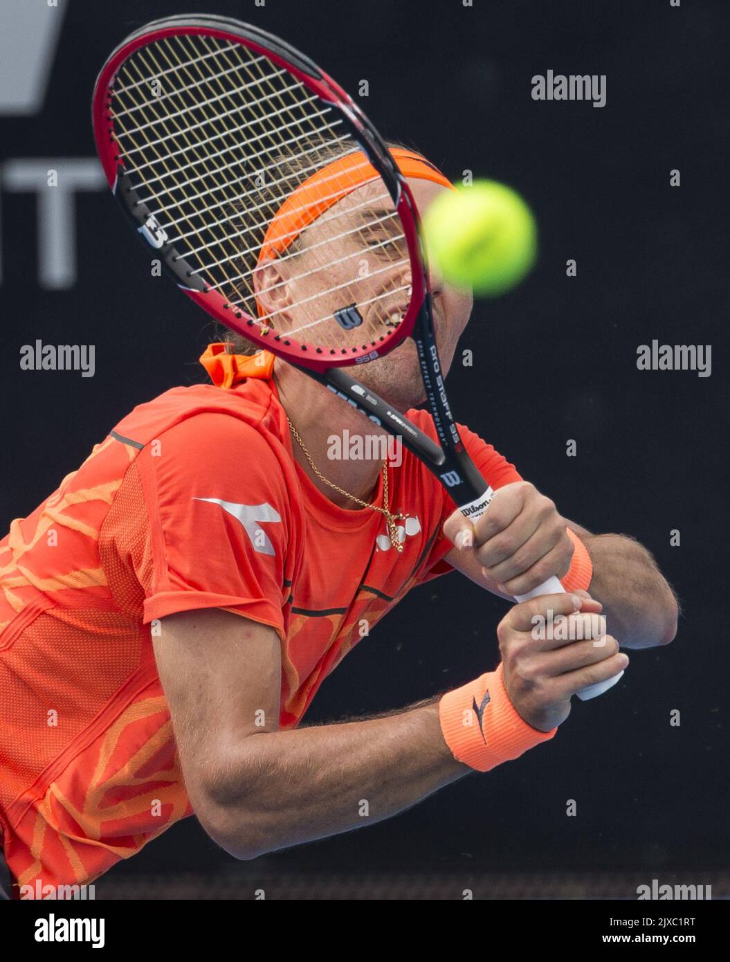 Alexandr Dolgopolov of the Ukraine plays a backhand to Fabio Fognini of ...