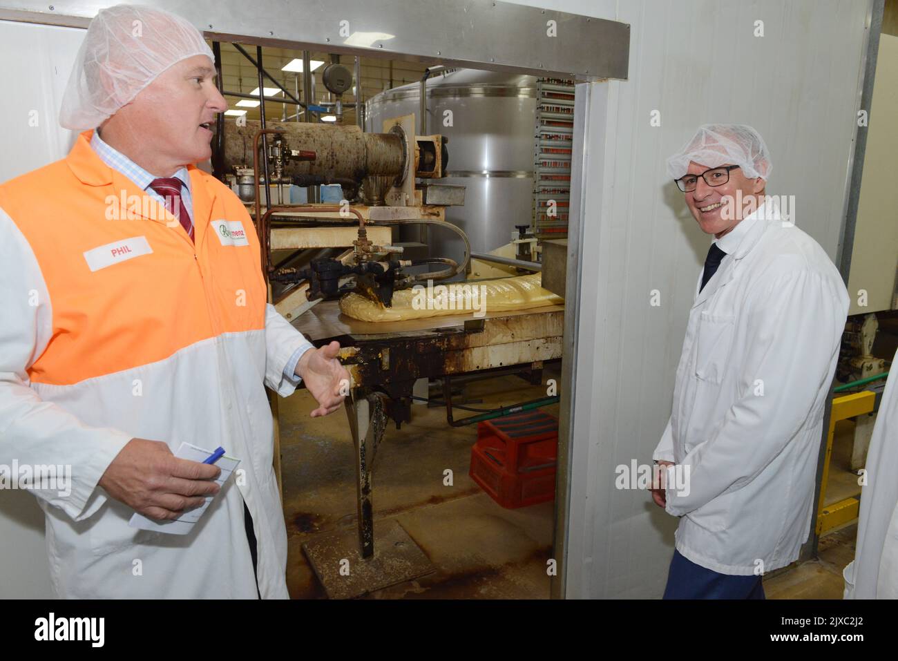 Robert Menz CEO Phil Sims (left) and SA Premier Jay Weatherill are seen ...