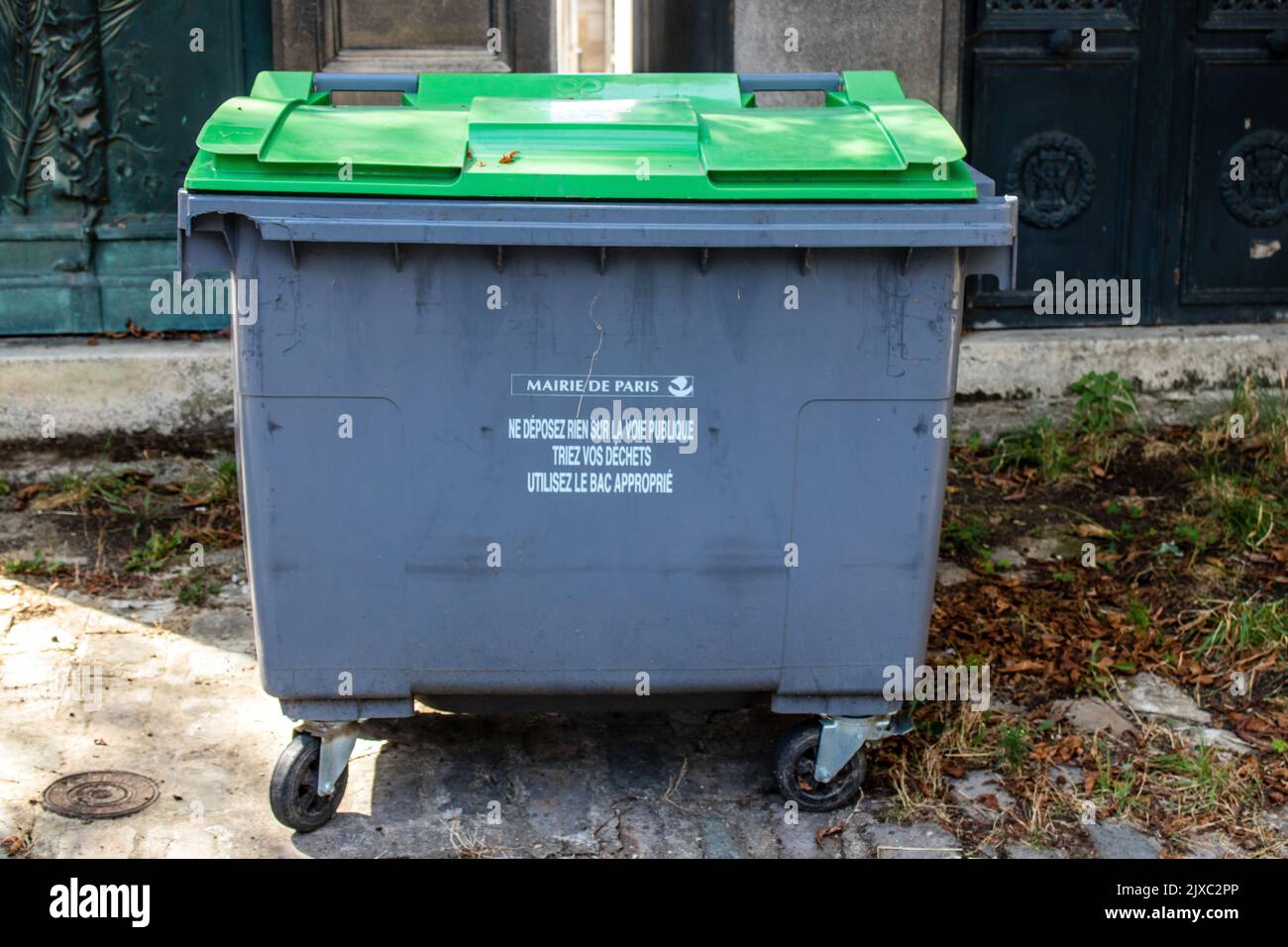 Paris, France - September 05, 2022 Garbage container in the downtown ...
