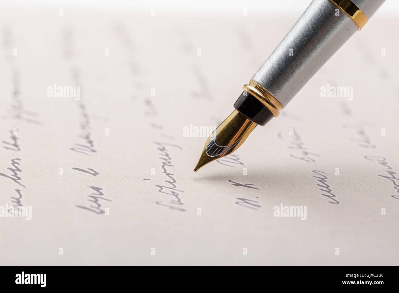 Fountain Pen on Written Page Stock Photo - Alamy