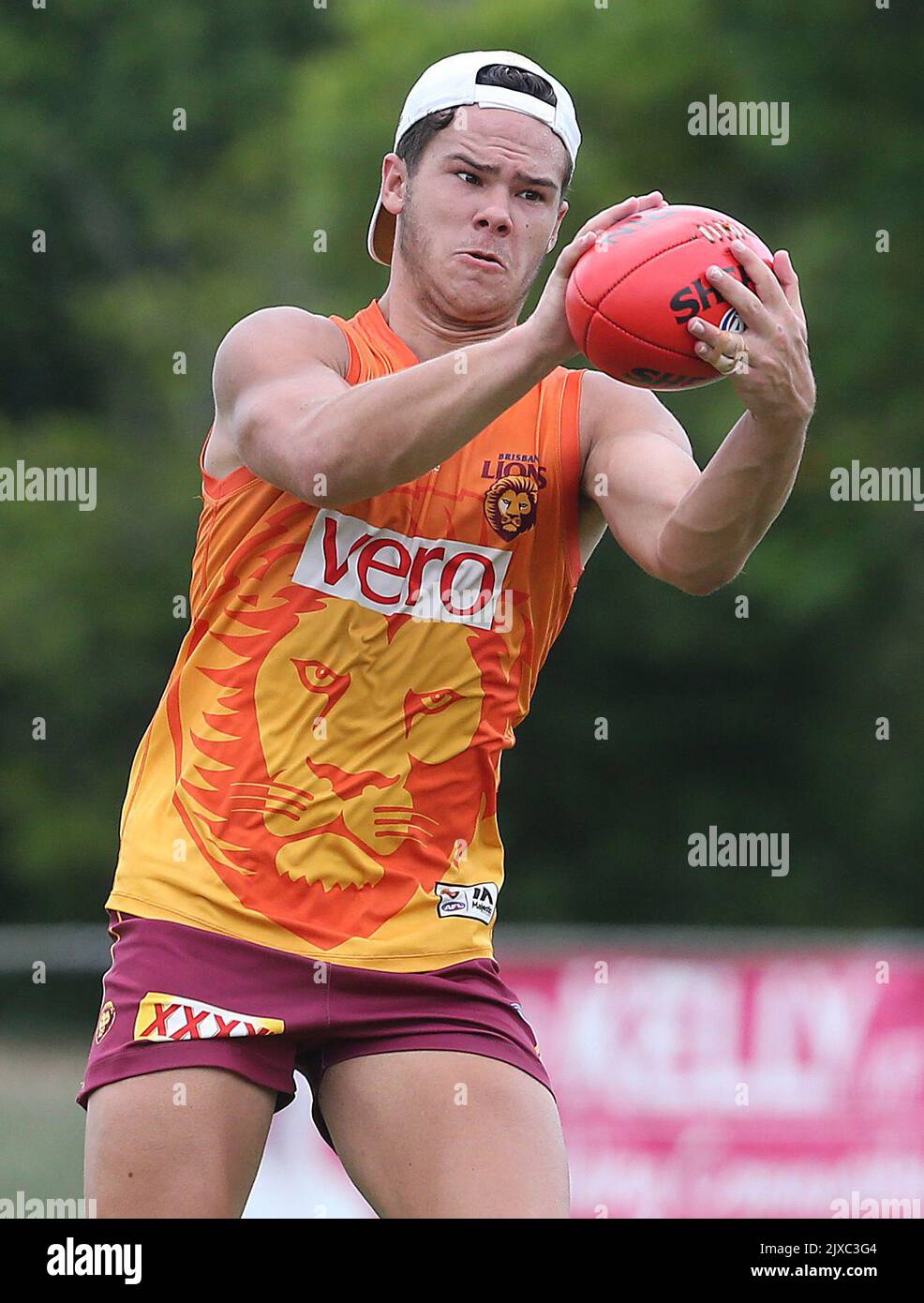 Cameron Rayner runs with the ball during a Brisbane Lions training ...