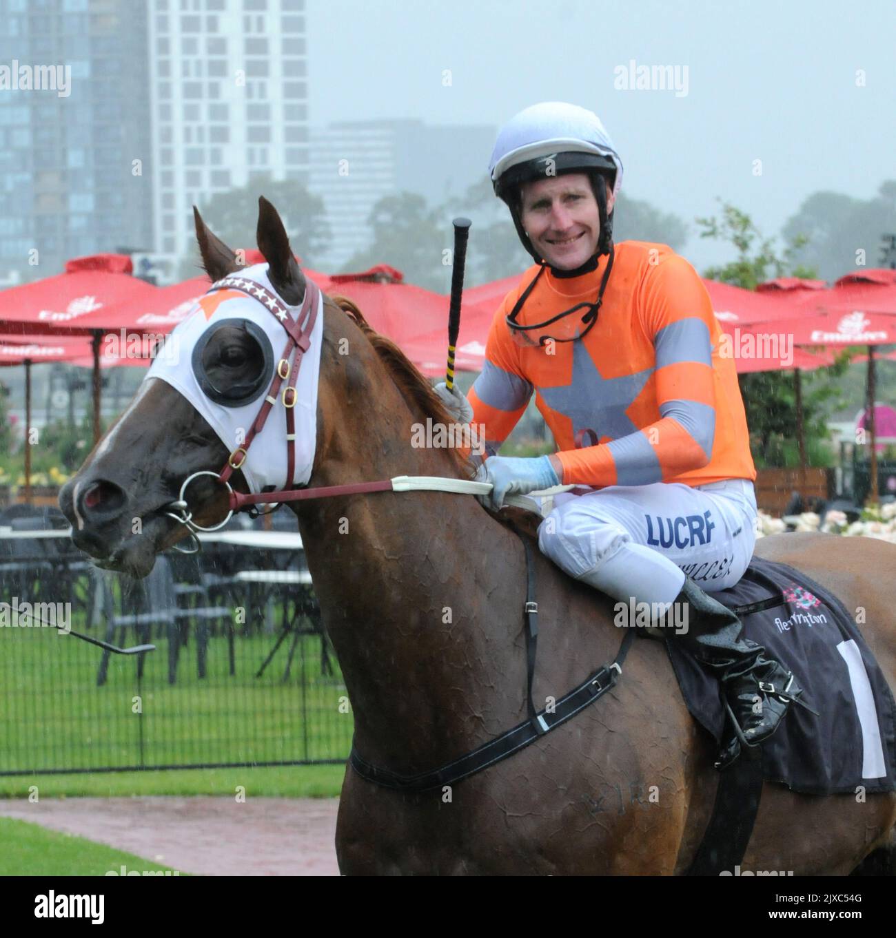 Jockey Brad Rawiller reacts after riding Burning Front to victory in ...