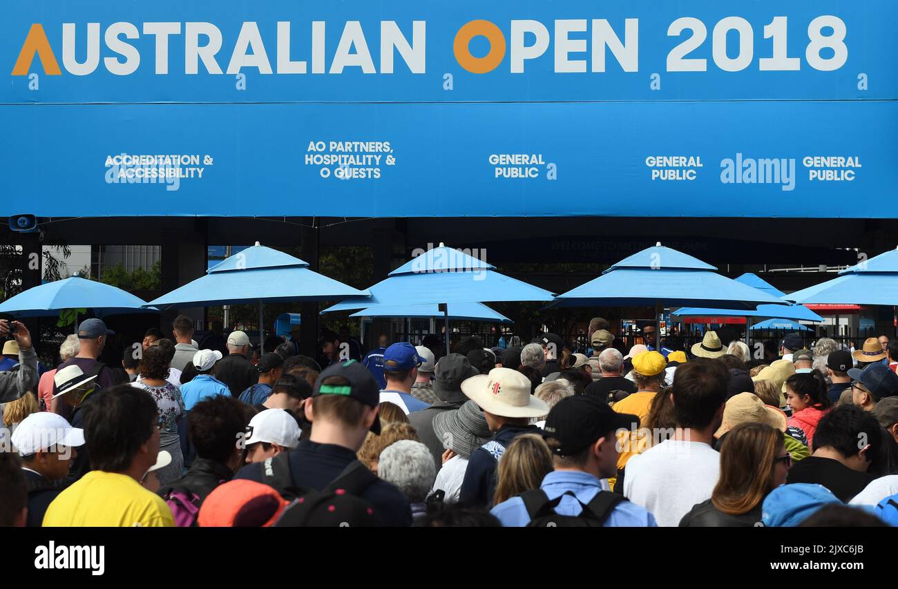 Fans queue at the gate for the Australian Open tennis tournament ...