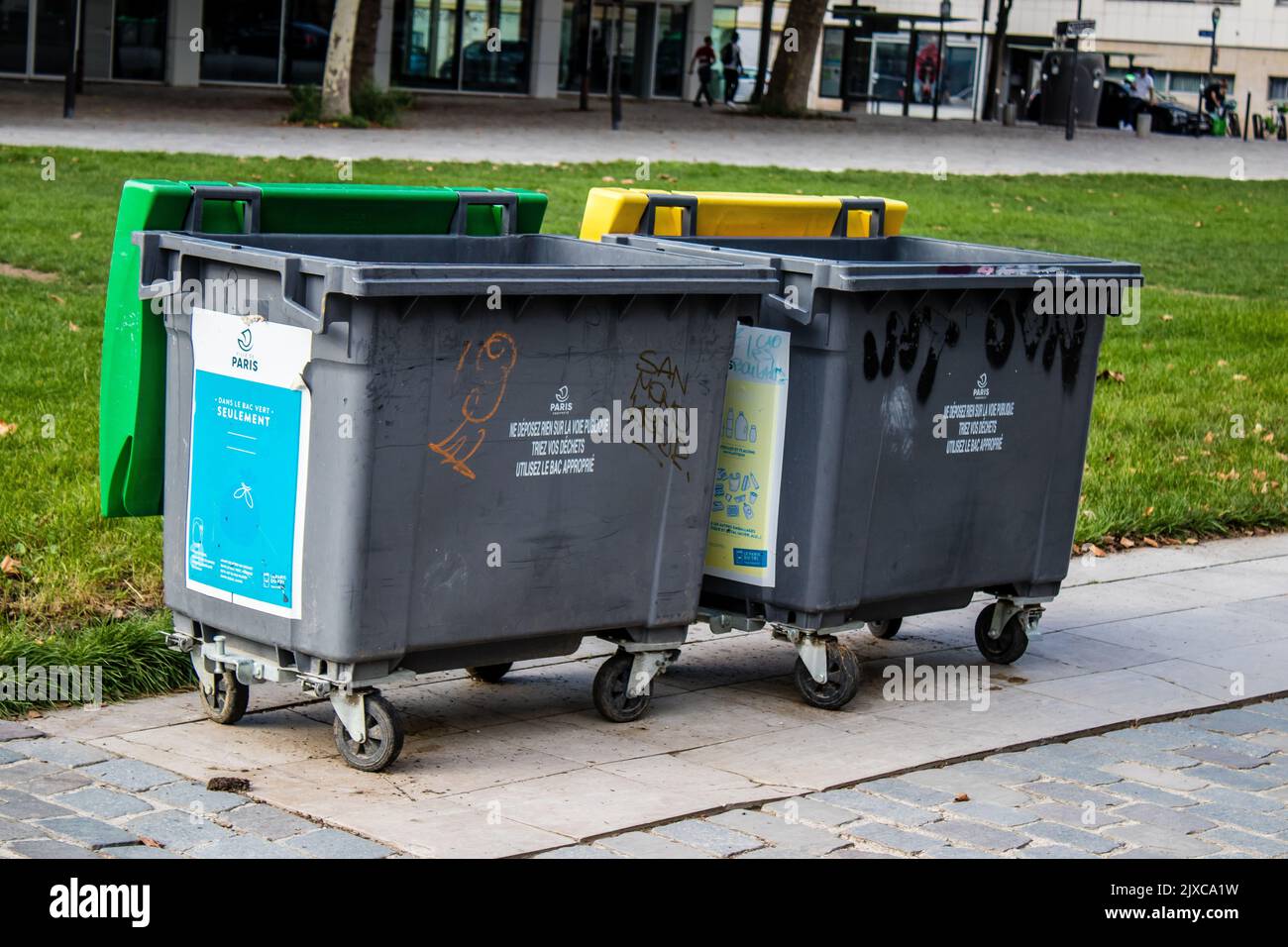 Paris, France - September 05, 2022 Garbage container in the downtown ...