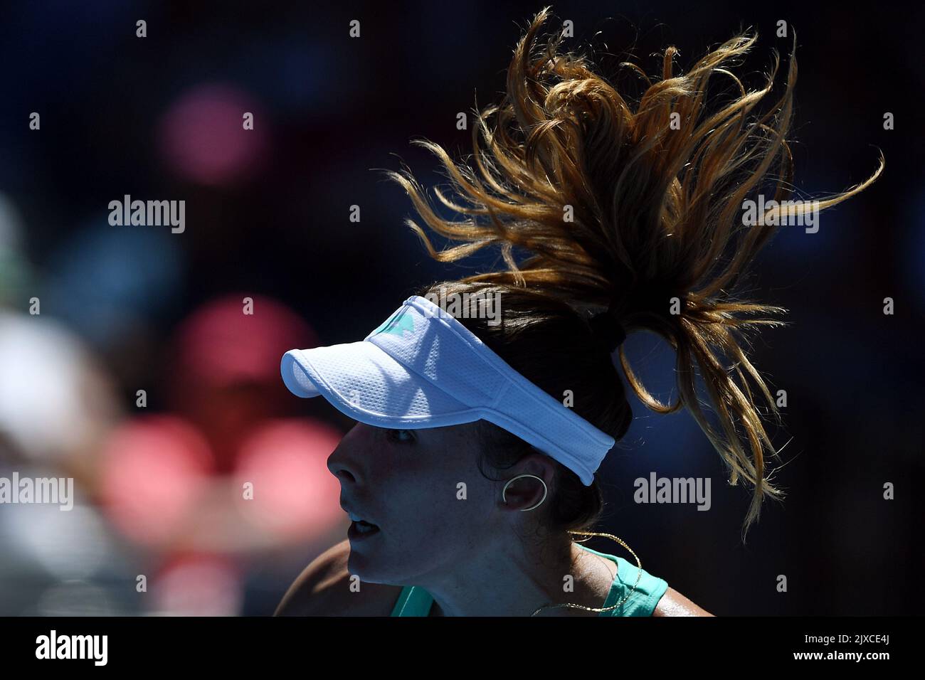 Alize Cornet of France in action against Elise Mertens of Belgium ...