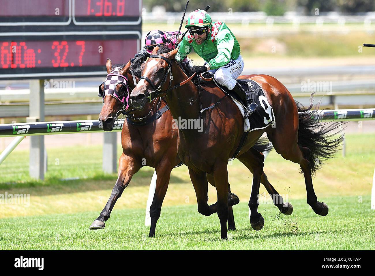 Jockey Larry Cassidy rides First Crush (right) to victory in Race 2 ...