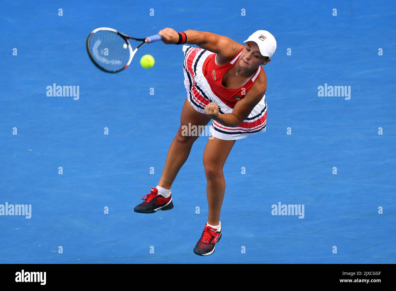 Ashleigh Barty of Australia in action against Naomi Osaka of Japan ...
