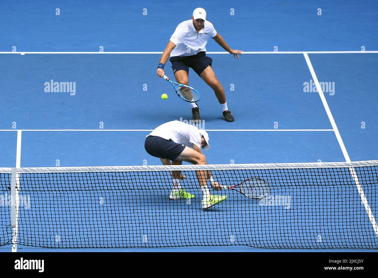 Fabrice Martin (top) and Jeremy Chardy of France in action against Bob ...