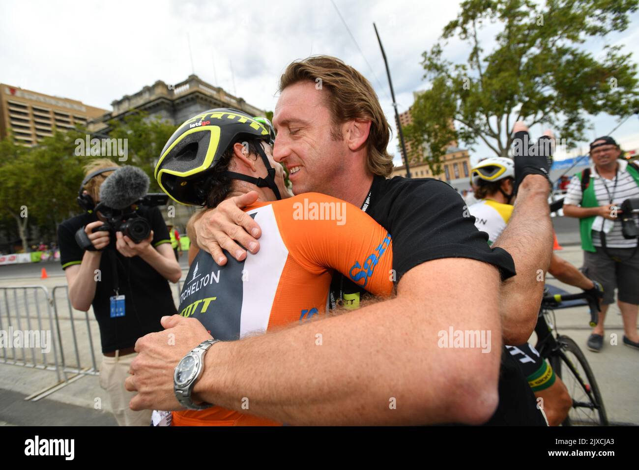 Daryl Impey celebrates with Matthew White after winning the Tour Down ...