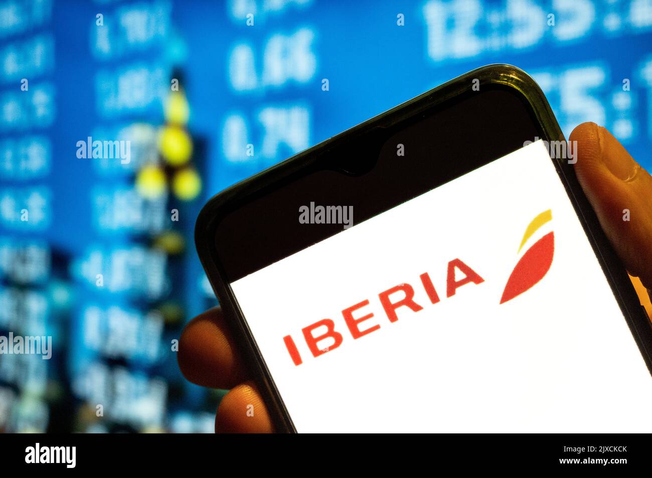 In this photo illustration, the Spanish airline Iberia logo is ...