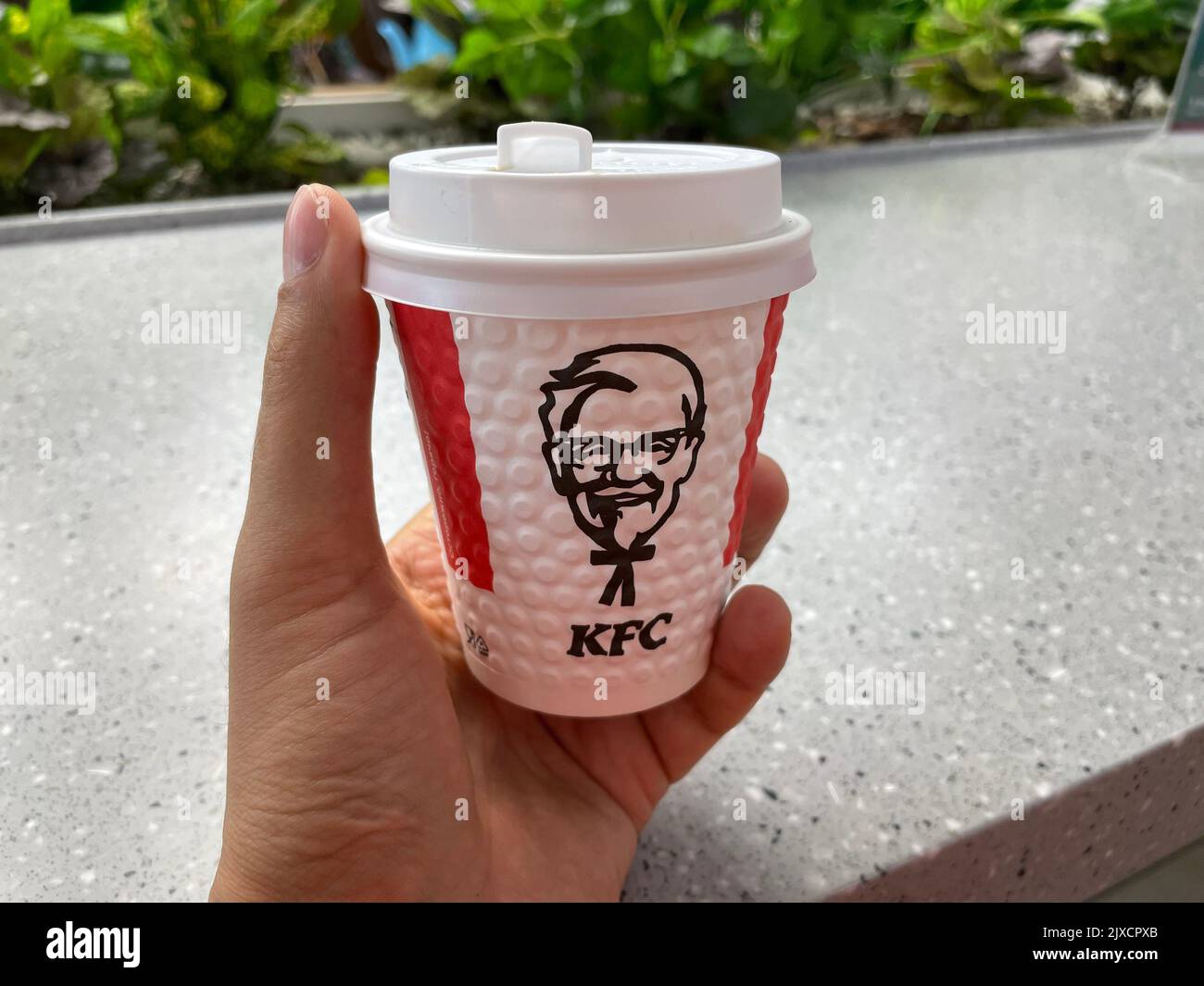Tyumen, Russia-August 13, 2022: Fried Chicken KFC logo coffee mug ...