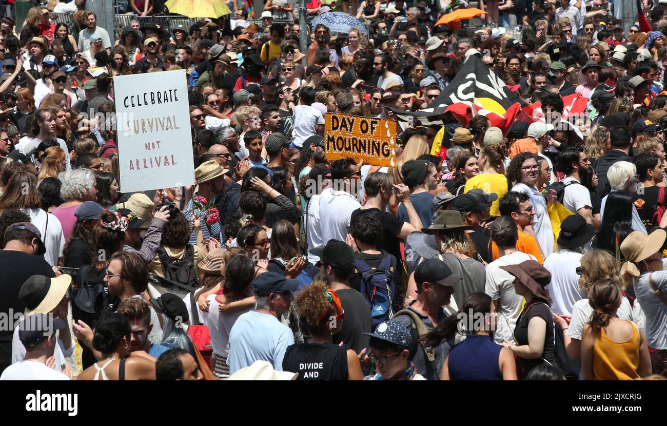 A large crowd of protesters take over the intersection in front of ...