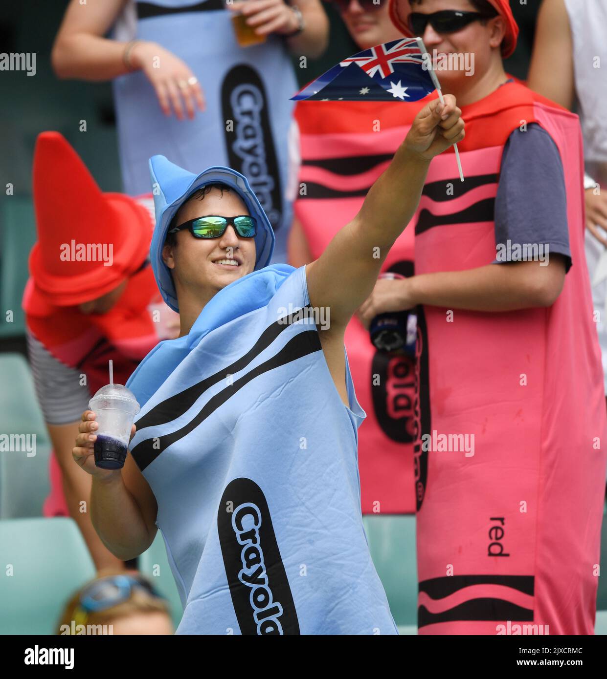 Spectators wear fancy dress costumes during Day 1 of the Sydney 7's ...