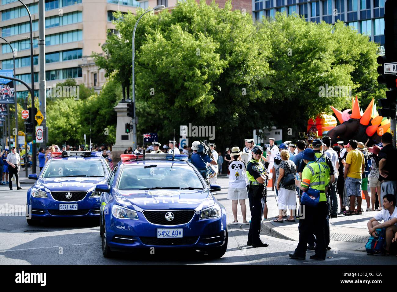 Police are seen watching the festivities at the Australia Day Parade ...