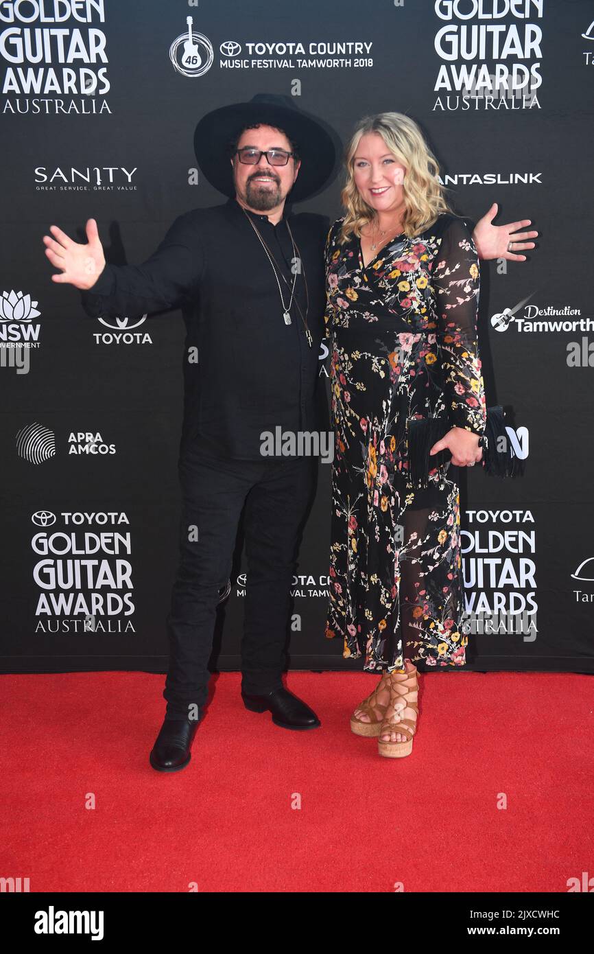 Singer Andrew Farriss (left) and his wife Marlina Neeley-Farriss on the ...