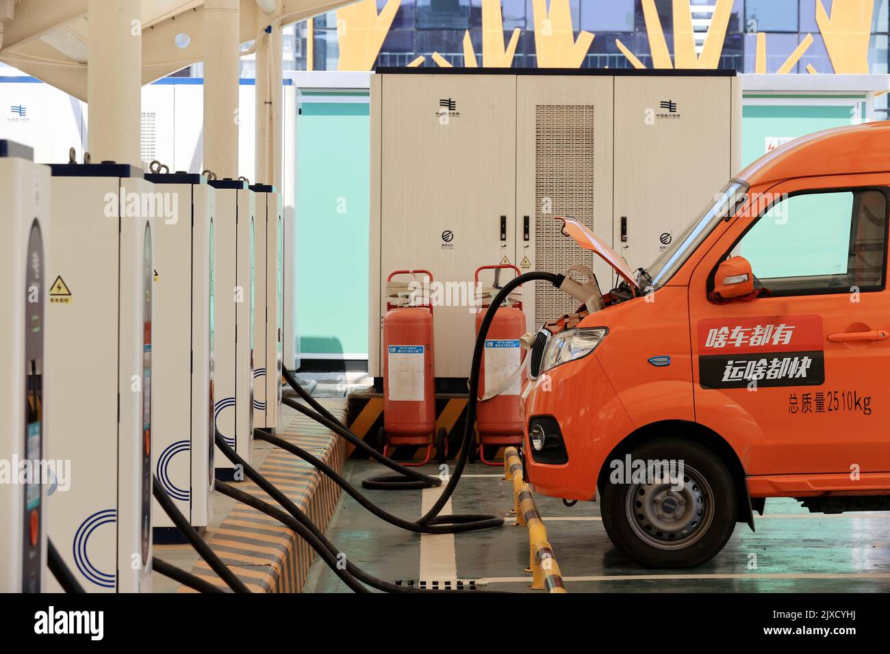 LIUZHOU, CHINA - SEPTEMBER 7, 2022 - An electric vehicle is charged ...